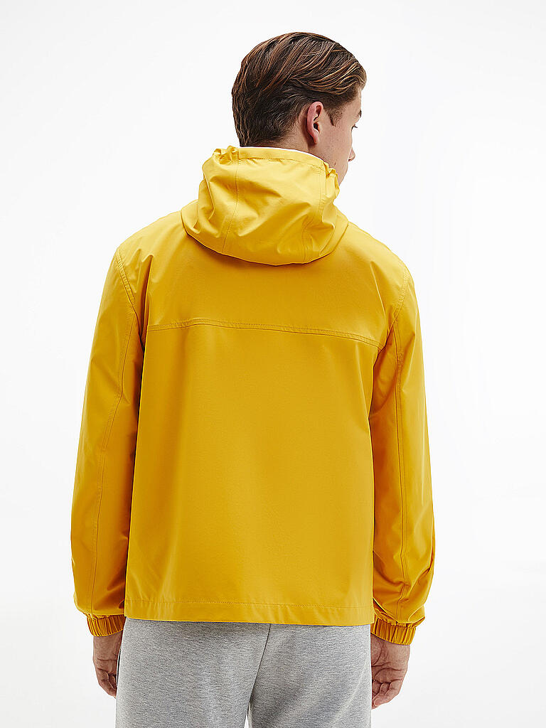 Yellow tommy hilfiger windbreaker jacket store